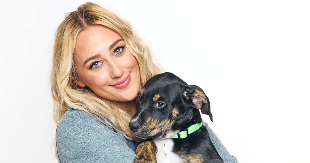 Ashley Cooke Gets Cozy With Adoptable Puppies While Discussing Her Most ...